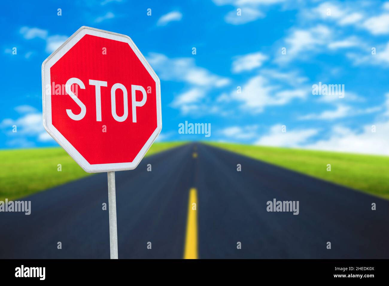 Red realistic stop road sign Stock Photo - Alamy