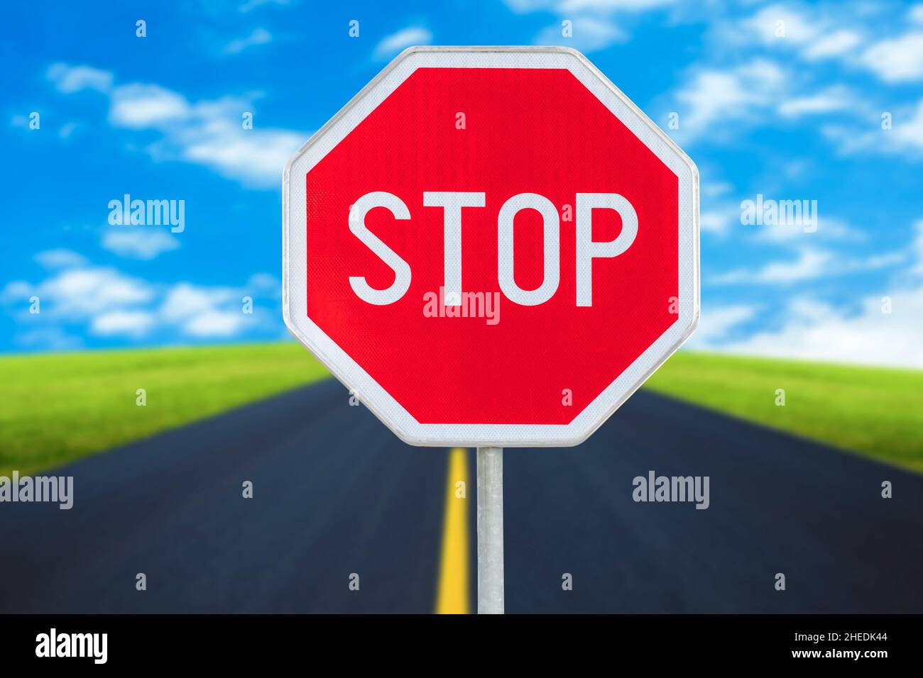 Red realistic stop road sign Stock Photo - Alamy