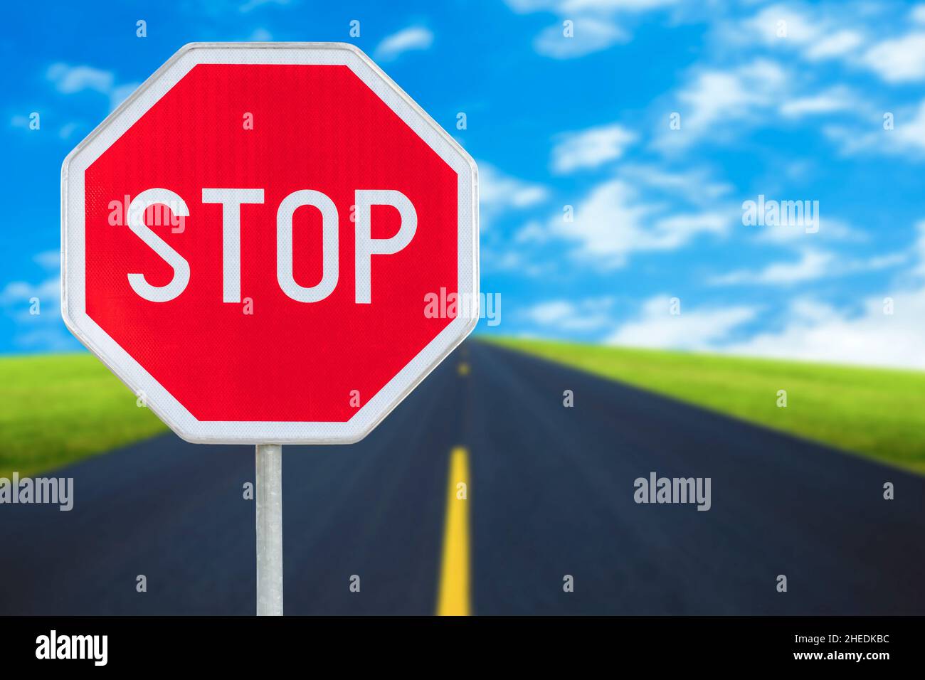 Red realistic stop road sign Stock Photo - Alamy