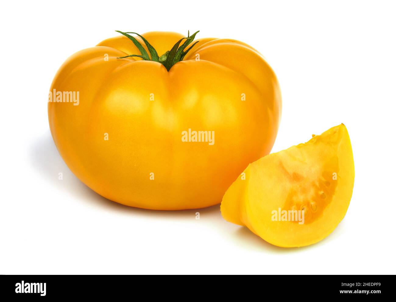 Big fresh yellow tomato isolated on white background Stock Photo - Alamy