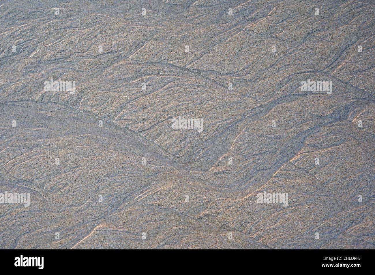 Beautiful structures in the brown sand beach. Ideal as background. View ...