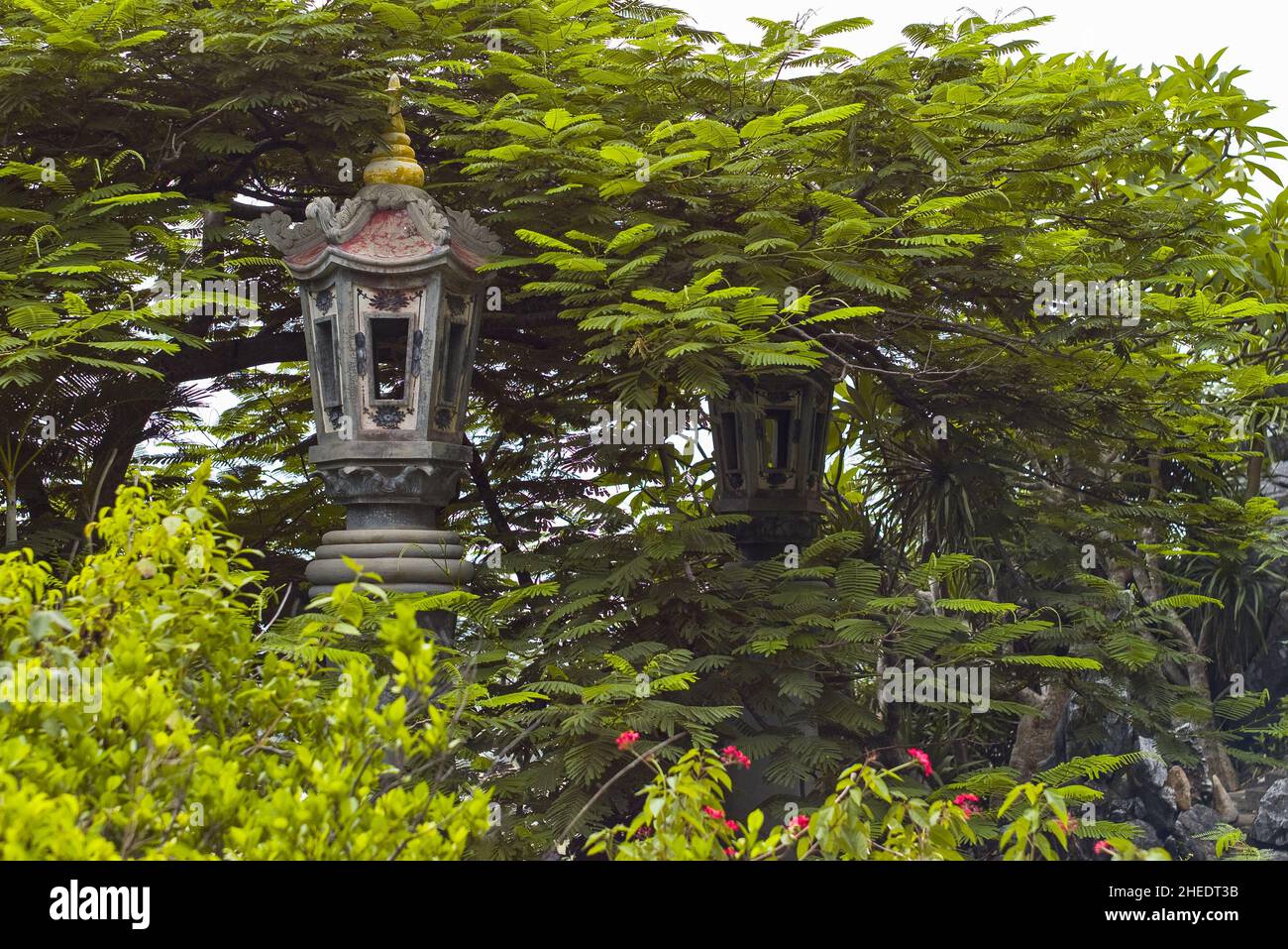 Vietnam, Danang, ancient lamps in the garden of the temple on the ...