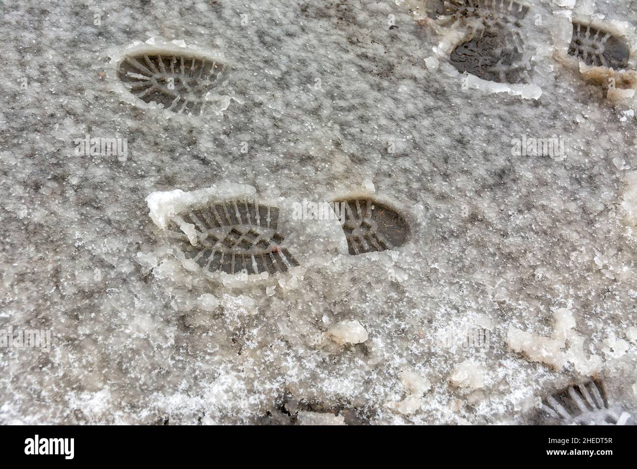 March thaw in the city with a drop and wet heavy snow Stock Photo - Alamy