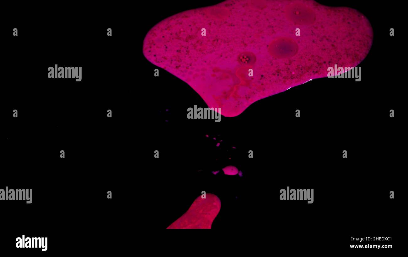 Abstract colorful paint reactions, psychedelic liquid light show, dye ...