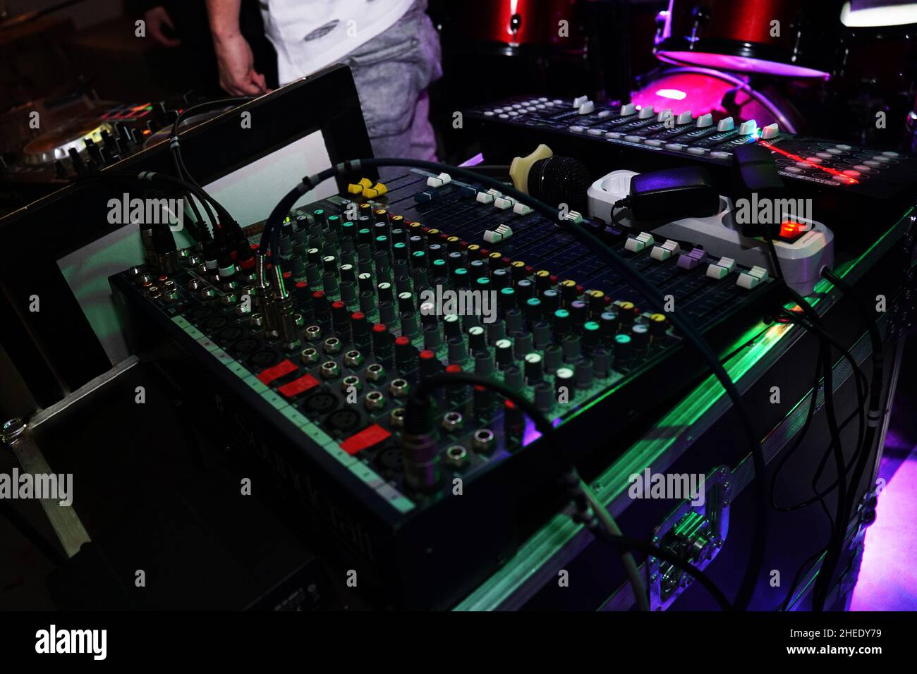 DJ console at the nightclub. Nightlife. Musicians performing in a ...
