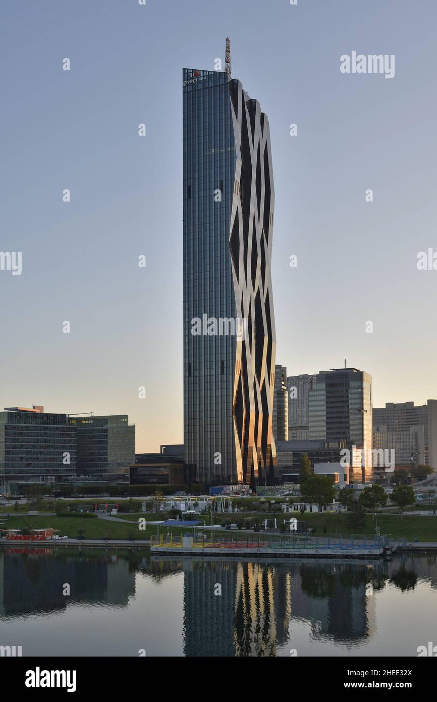 DC Tower 1 - modern landmark skyscraper reflecting in river Danube at ...