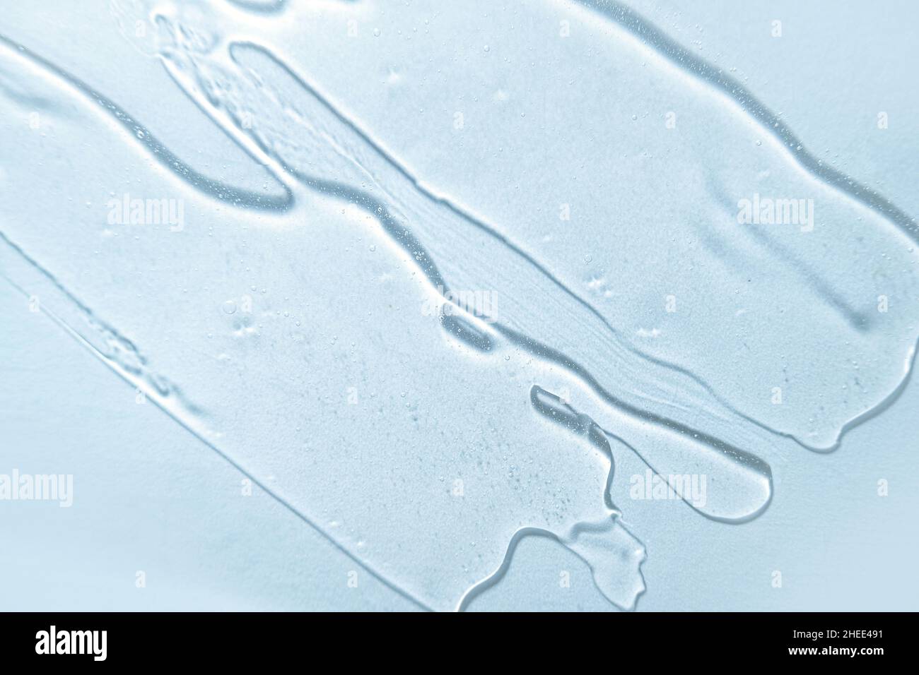 Liquid blue gel cosmetic smudge background. Water Stock Photo - Alamy