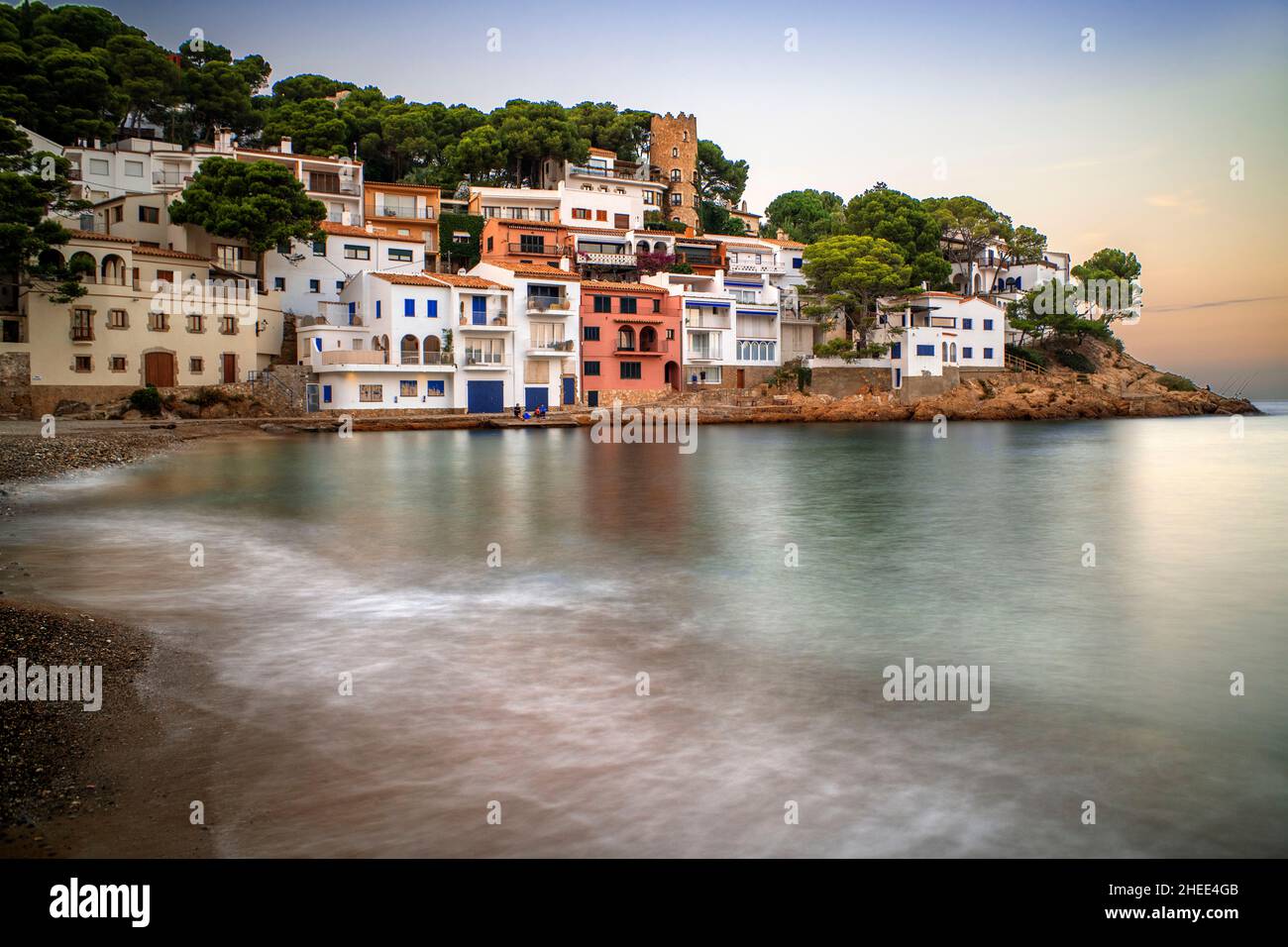Houses and fishing boats by the sea, Sa Tuna beach in Begur, Costa ...