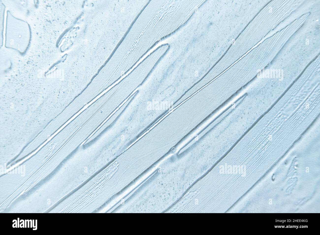 Liquid blue gel cosmetic smudge background. Water Stock Photo - Alamy