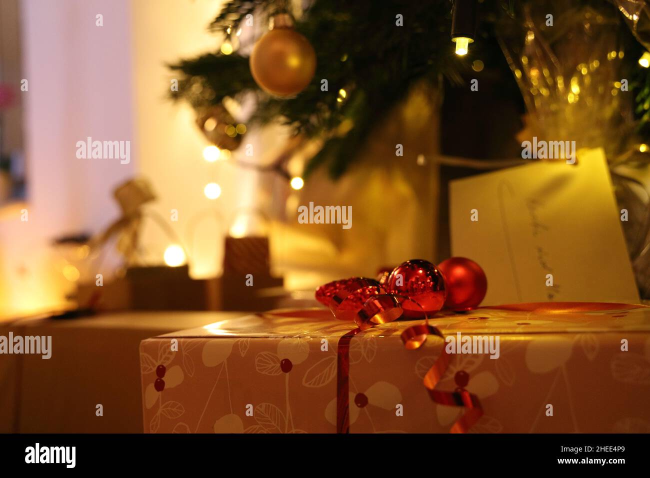 Christmas Present under the Tree Stock Photo - Alamy