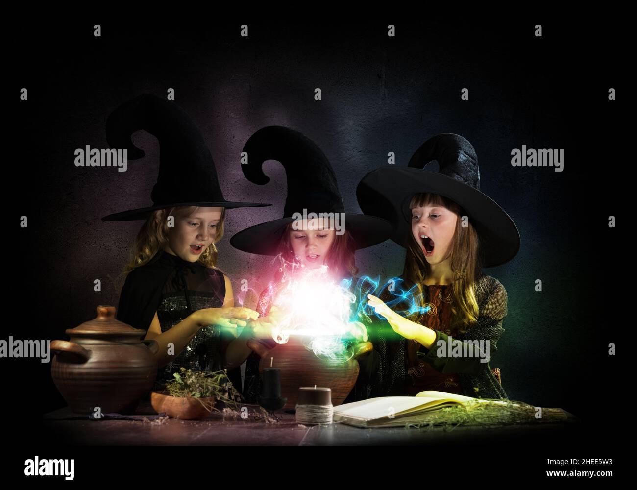 Three little witches Stock Photo - Alamy