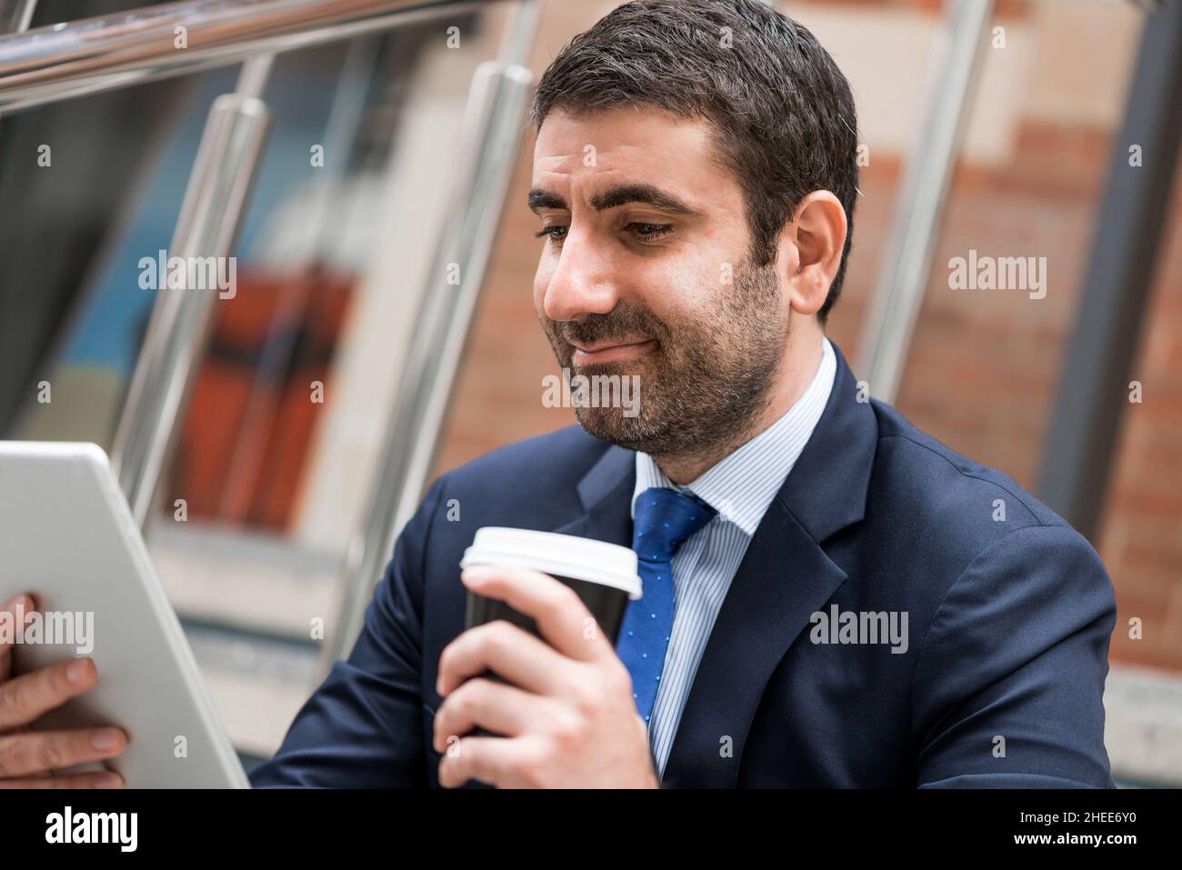 Coffee break at work Stock Photo - Alamy