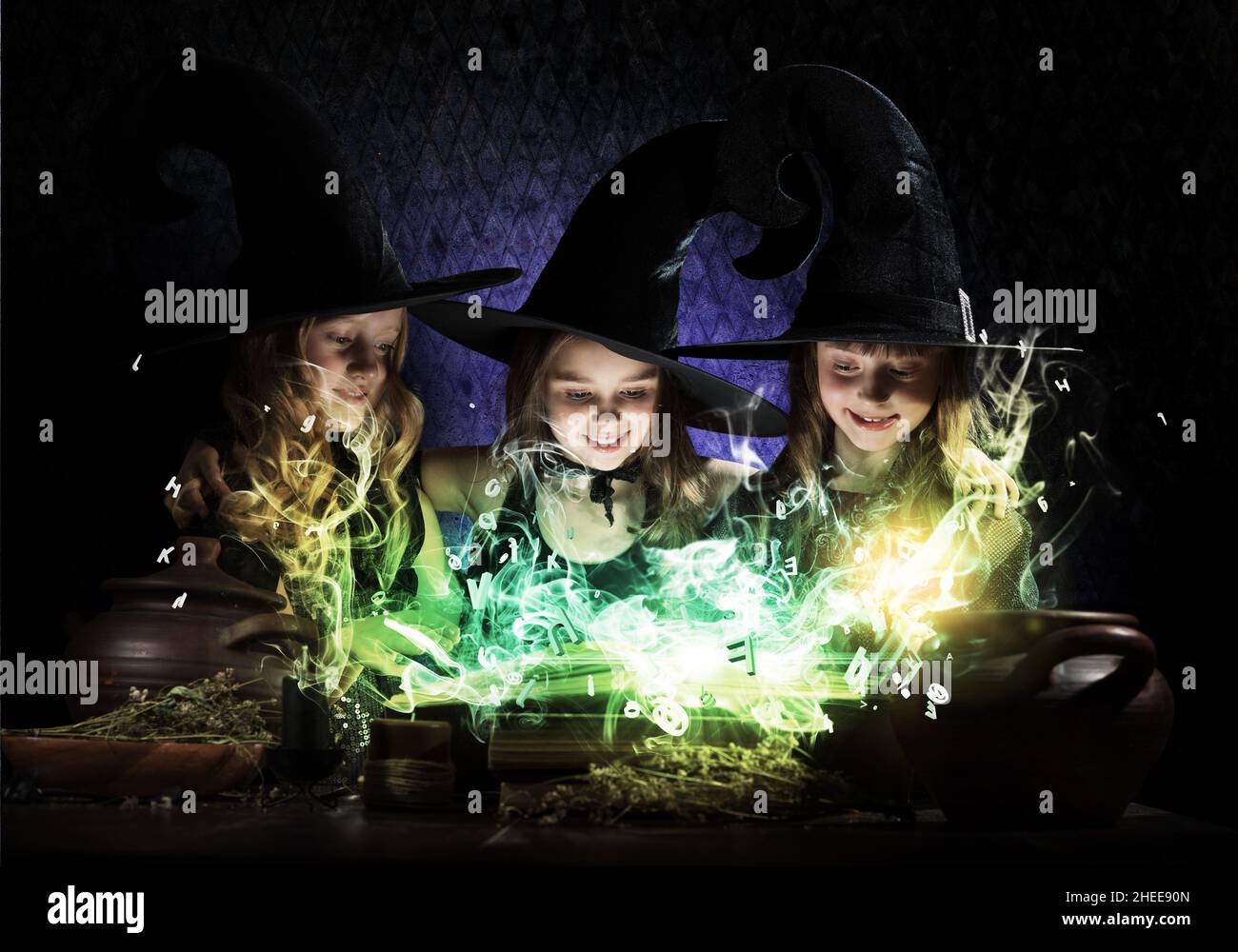 Three little witches Stock Photo - Alamy