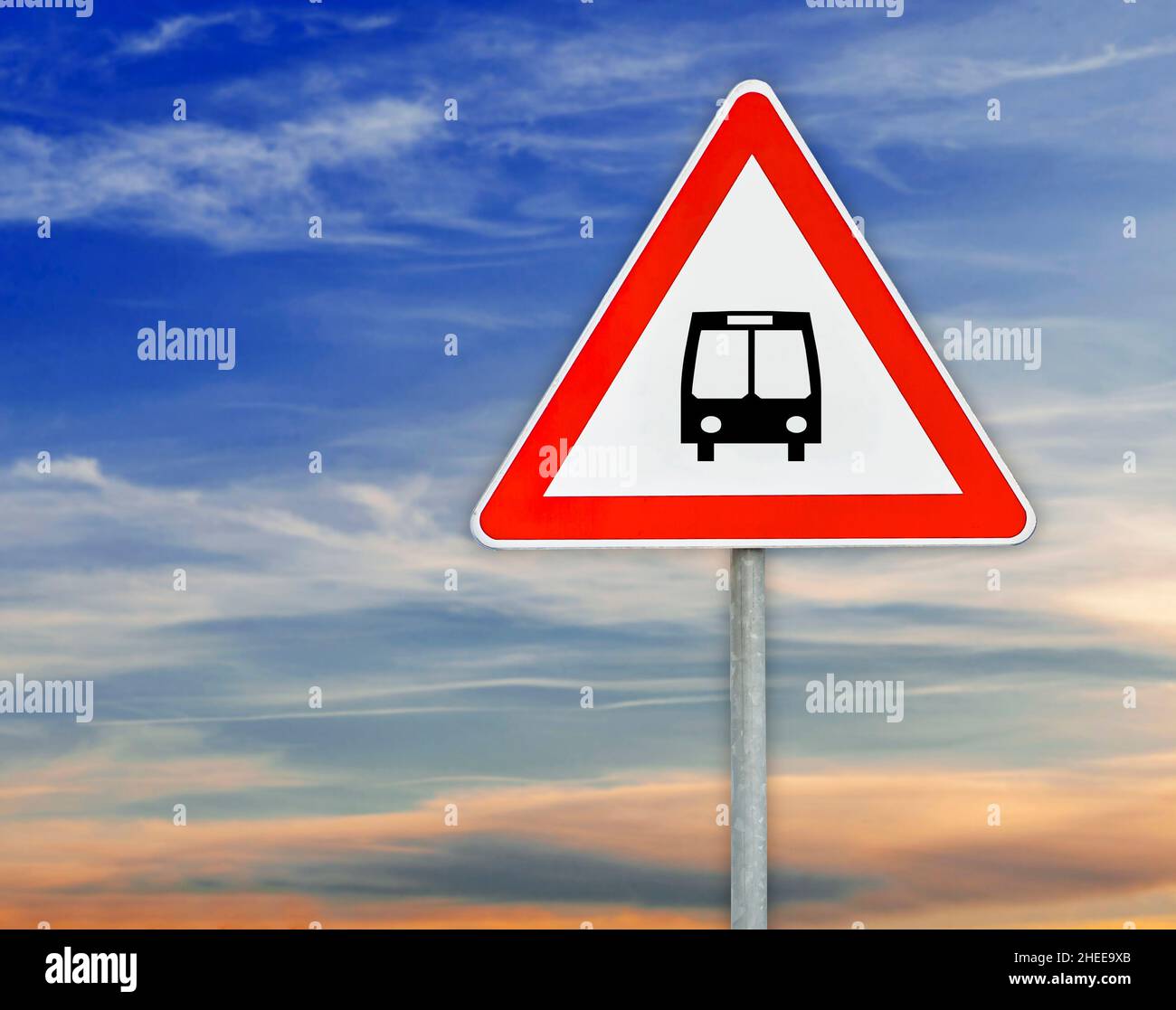 Triangle on rod road sign bus stop Stock Photo - Alamy