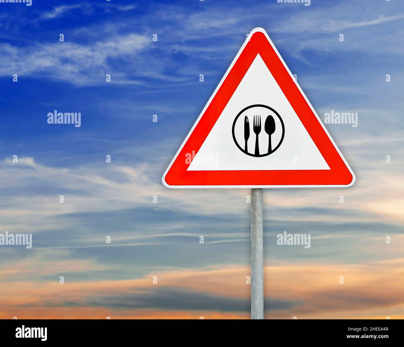 Triangle on rod road sign restaurant attention Stock Photo - Alamy