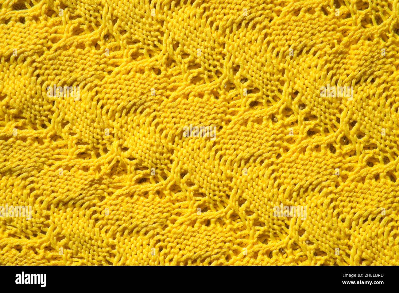 Yellow wool texture as fabric and textile background. Knitted wool ...