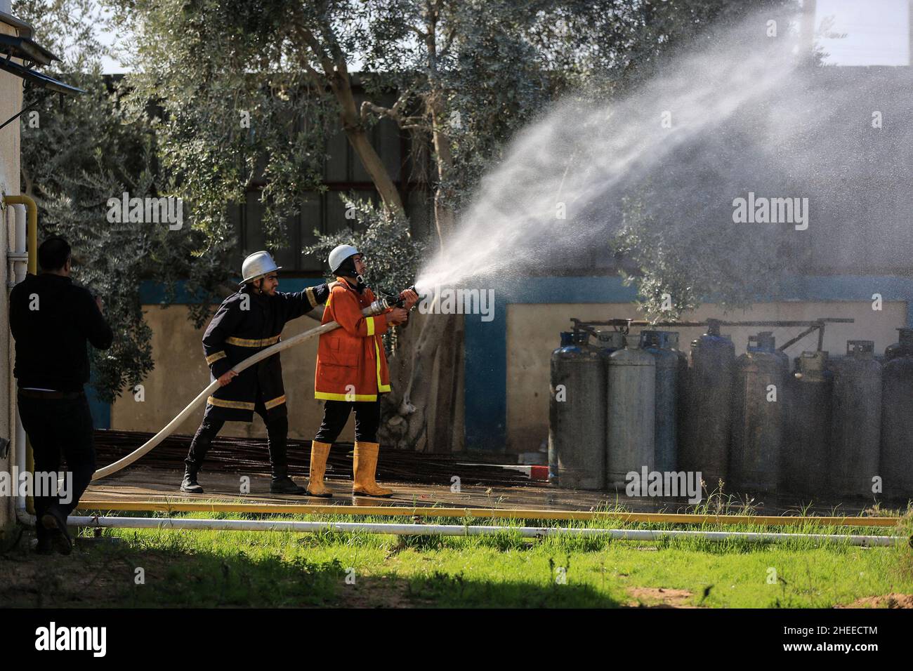 The Palestinian Civil Defense is conducting a field maneuver in ...