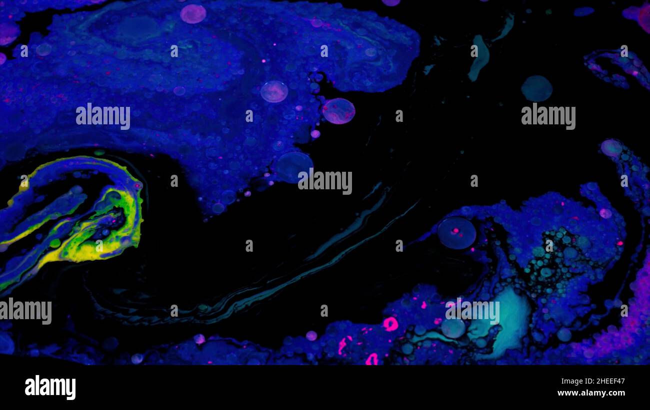 Abstract colorful paint reactions, psychedelic liquid light show, dye ...