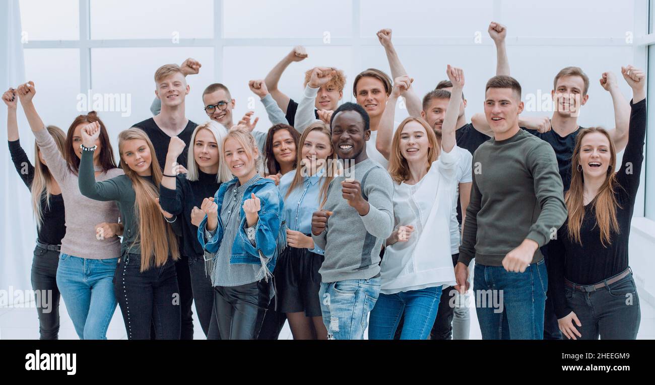 close up. a fun group of friends standing together Stock Photo - Alamy