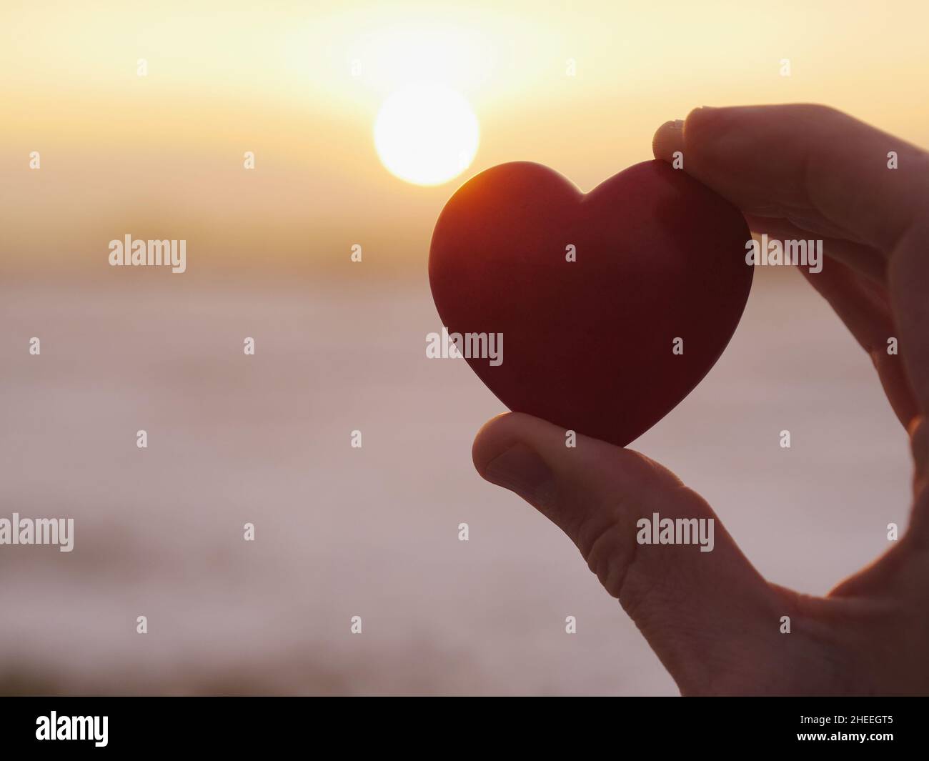 heart sunset love Stock Photo - Alamy