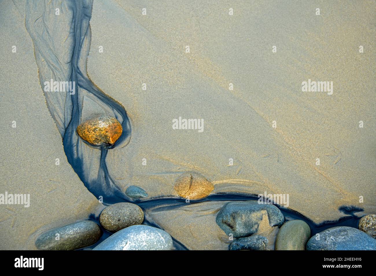 Natural textures and design at the beachduring the low tide Stock Photo ...