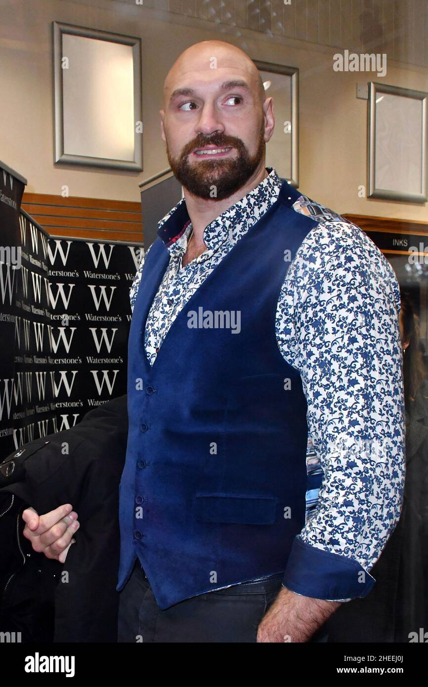 London - Britain - 20191113 Tyson Furyprofessional boxersigns copies of ...