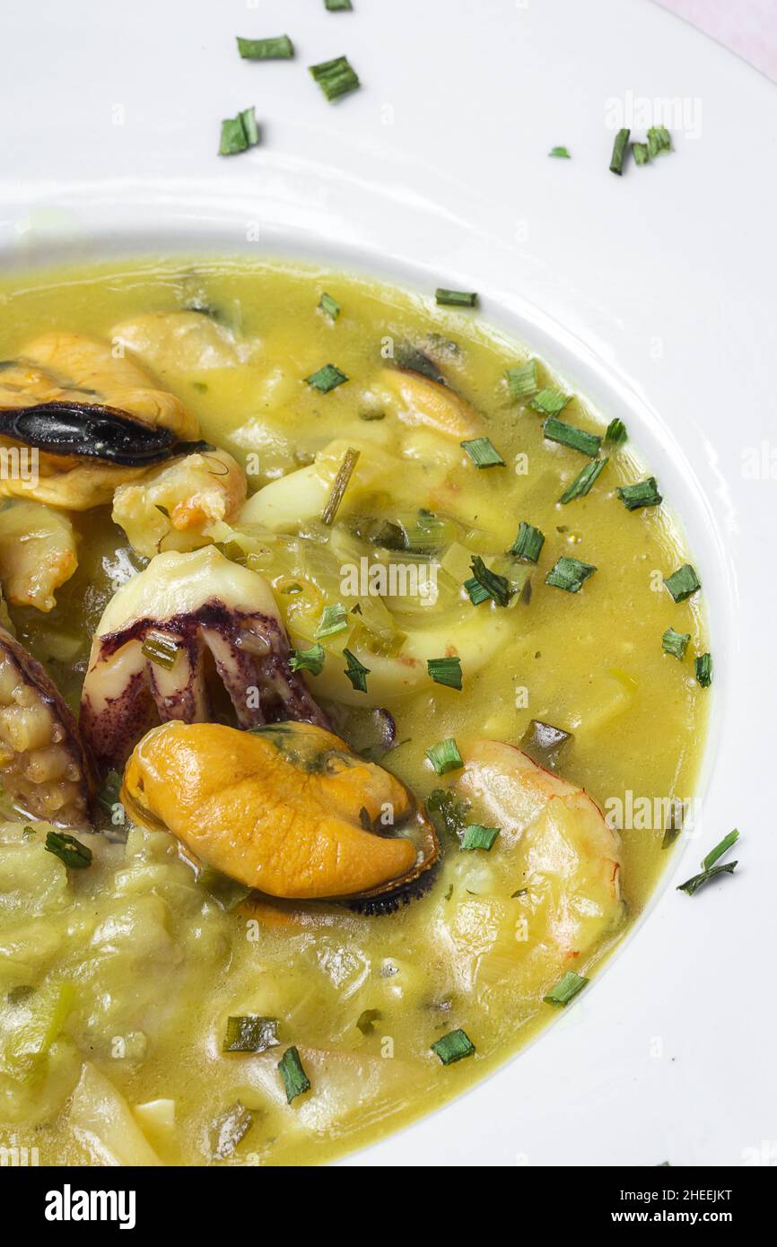 Top view of a dish of typical cuisine of the Basque country of monkfish ...