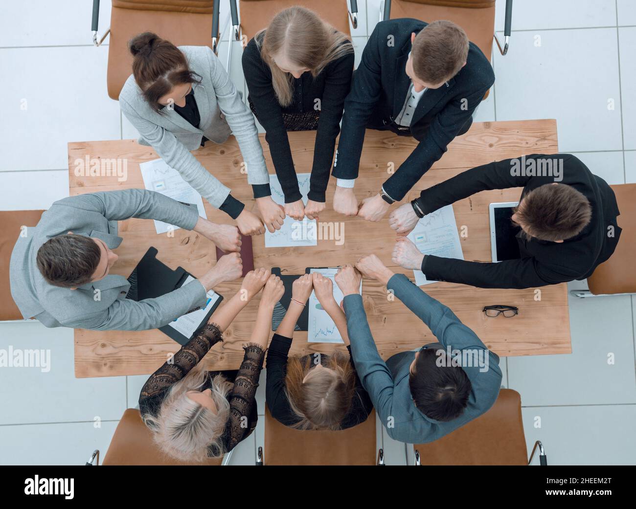 top view. business team showing their unity Stock Photo - Alamy