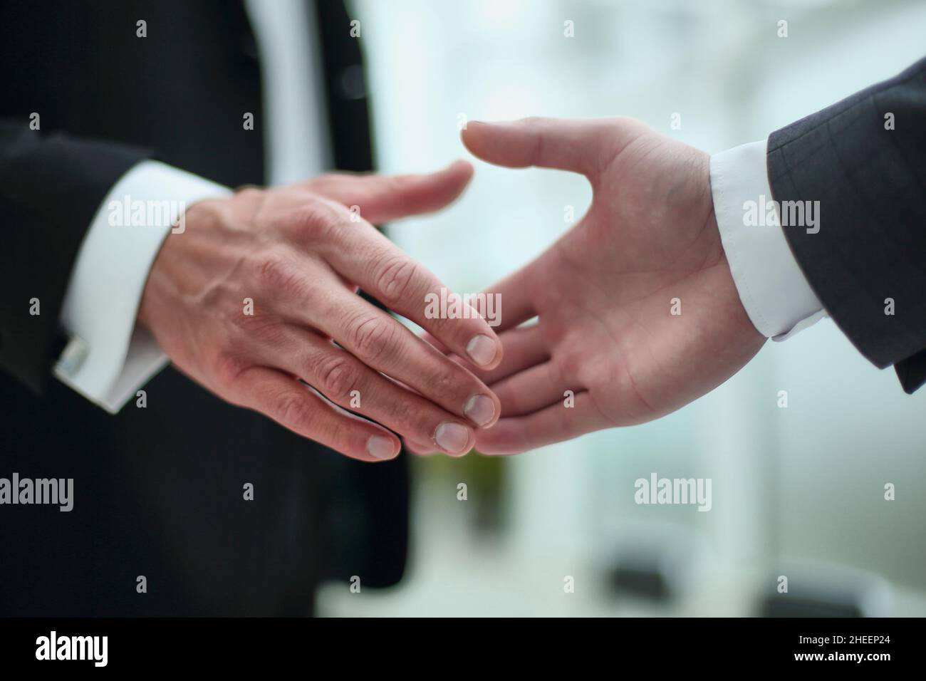 image of business people holding out their hands for a handshake Stock ...