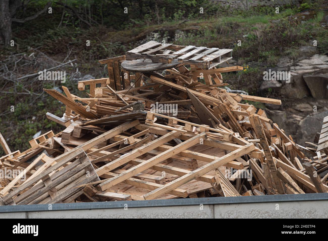 Destroyed wooden pallets at a landfill Stock Photo - Alamy