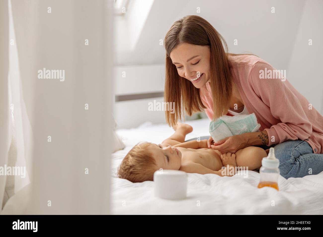 Diaper change toddler hi-res stock photography and images - Alamy