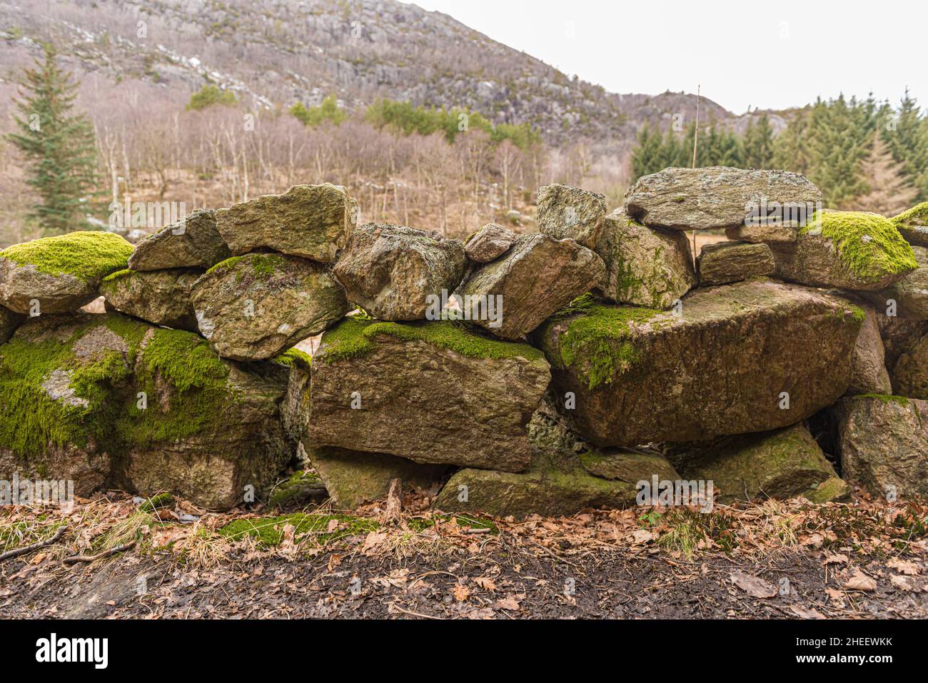 Old stone fence by a field Stock Photo - Alamy