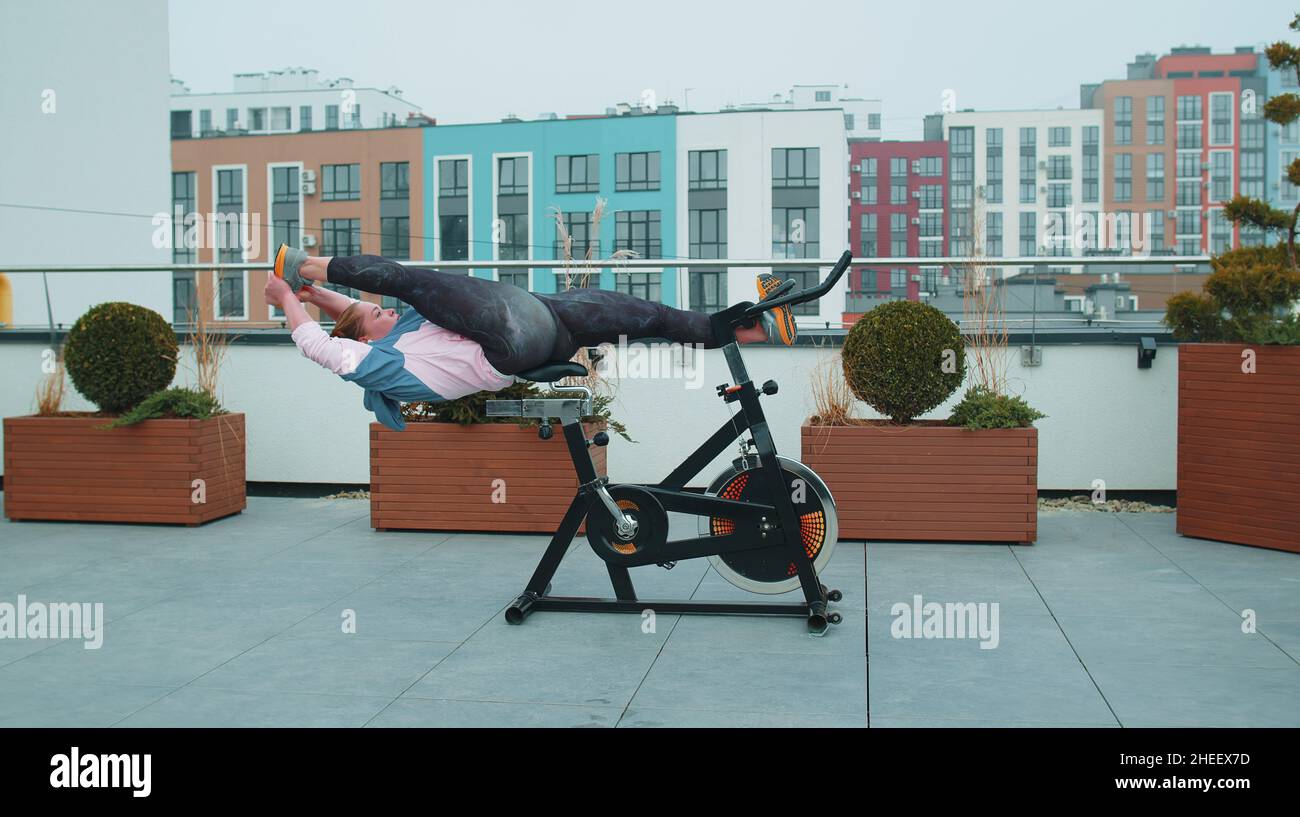 Caucasian woman coach making stretching aerobic training exercises on ...