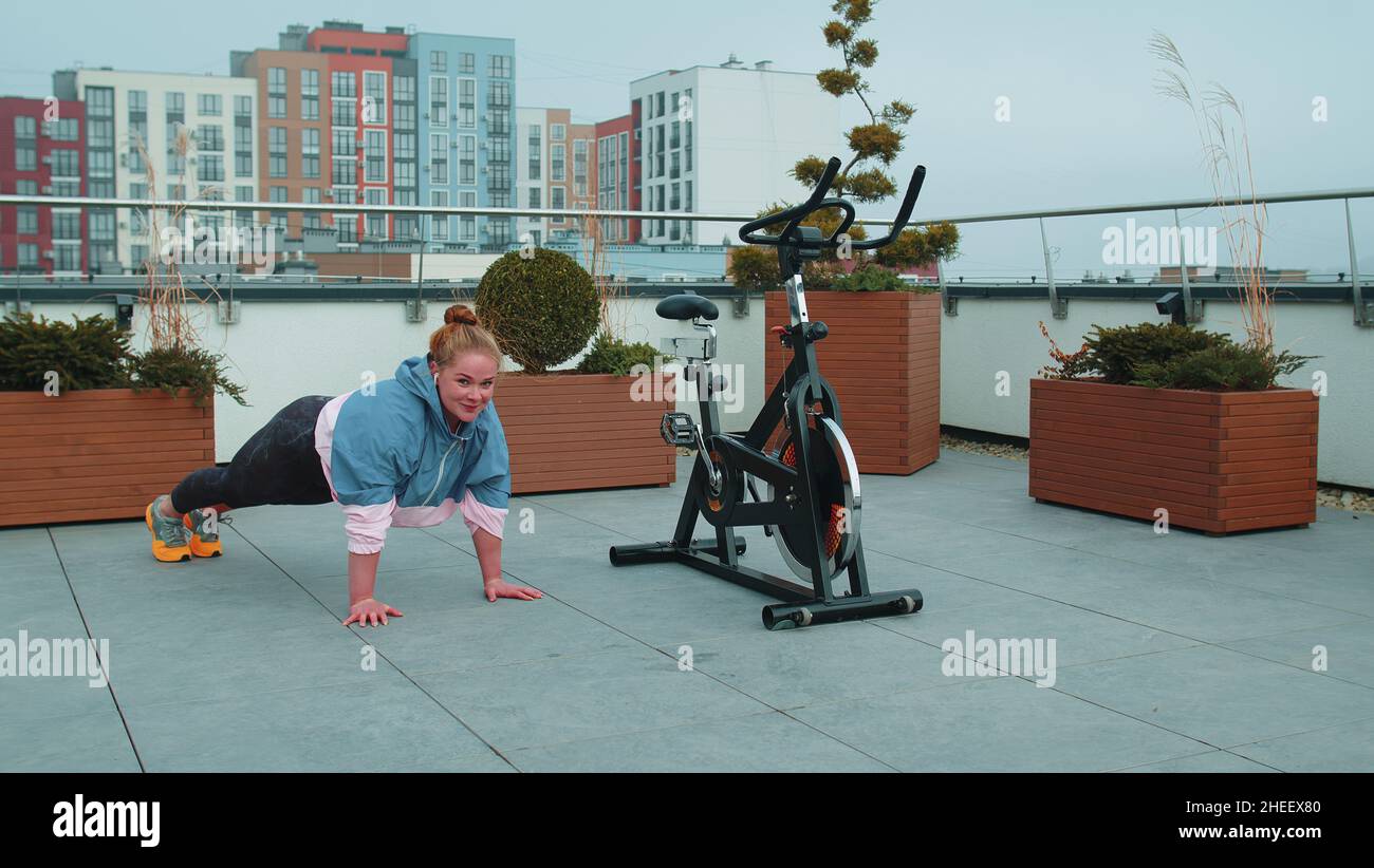 Athletic sport girl doing running plank, cross fitness, bodybuilding ...