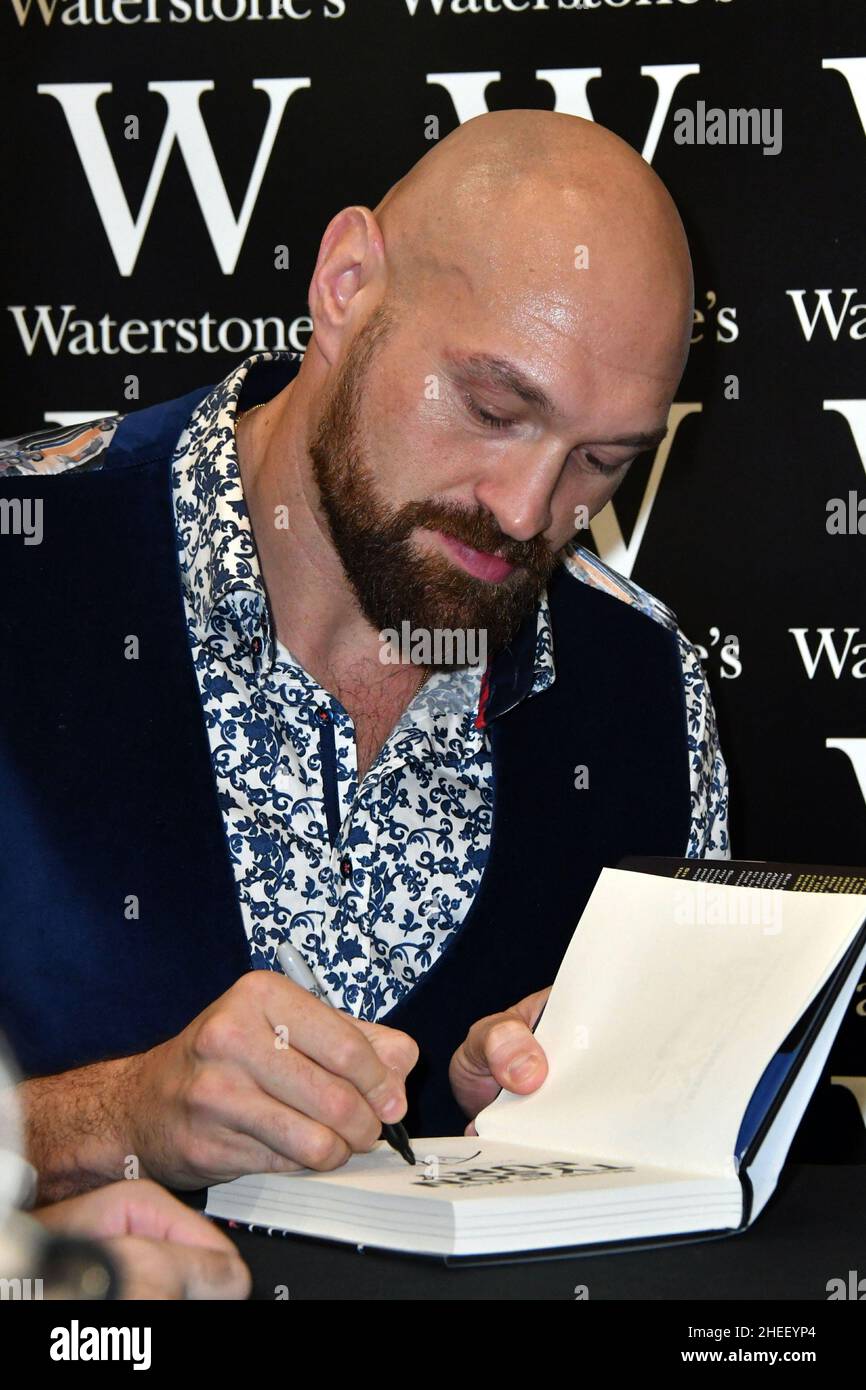 London - Britain - 20191113 Tyson Furyprofessional boxersigns copies of ...