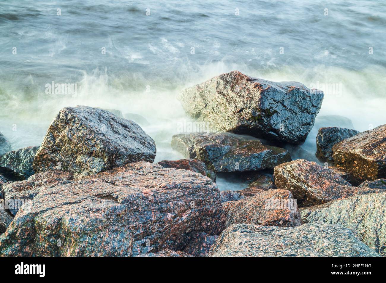 wave beating stone rocks long exposure magic arty splashes Stock Photo ...