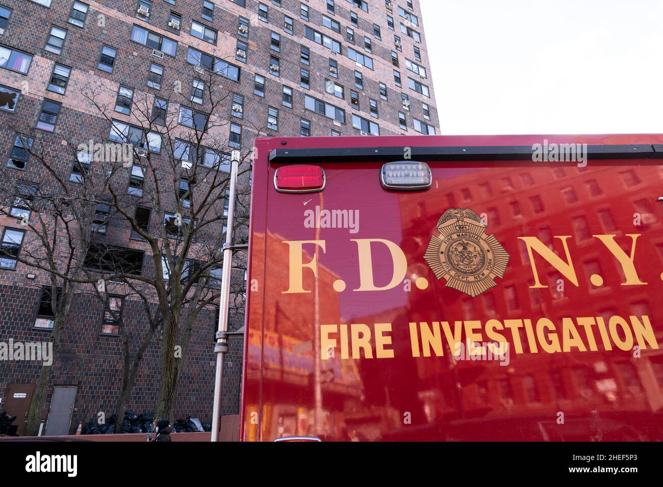 Fire marshal investigation truck parked at devastated building where deadly fire caused by ...