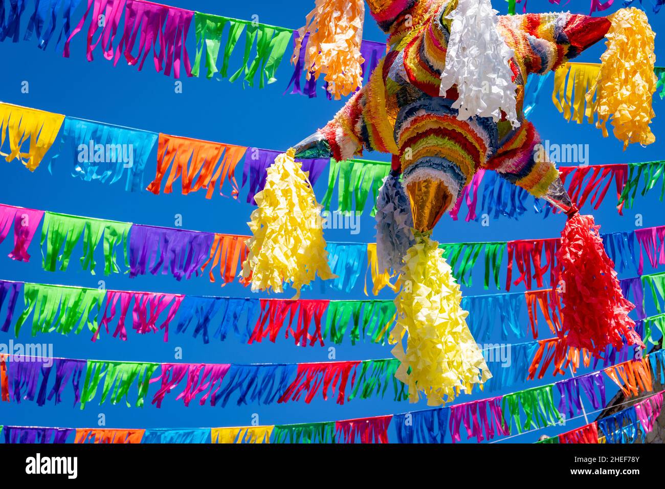 Mexican fiesta with traditional piñata and paper flags in Oaxaca Stock ...
