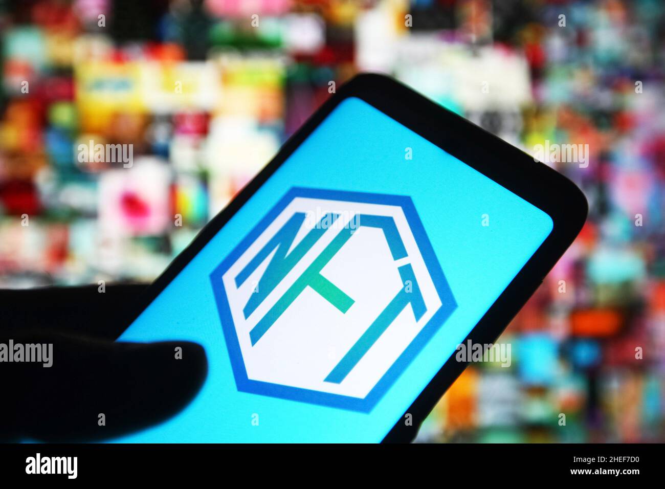 In this photo illustration, a NFT (Non-fungible token) sign is seen on a smartphone. (Photo by ...