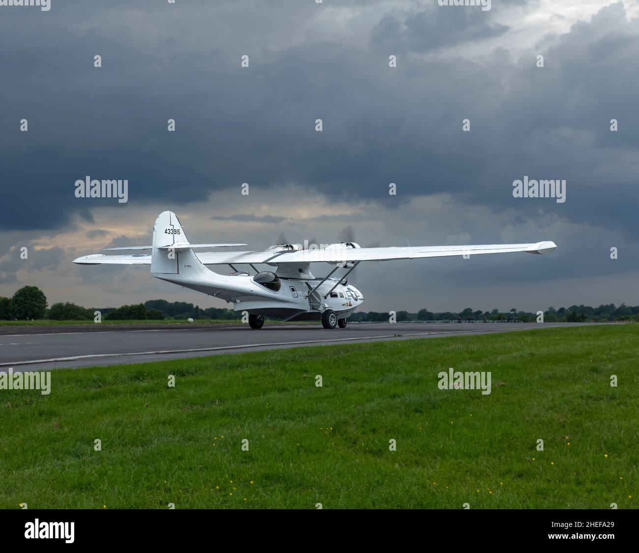 Rear of Consolidated seaplane taking off on runway Stock Photo - Alamy