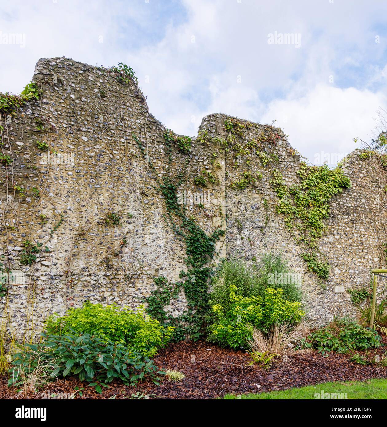 The remains and ruins of the medieval city wall and battlements by the ...