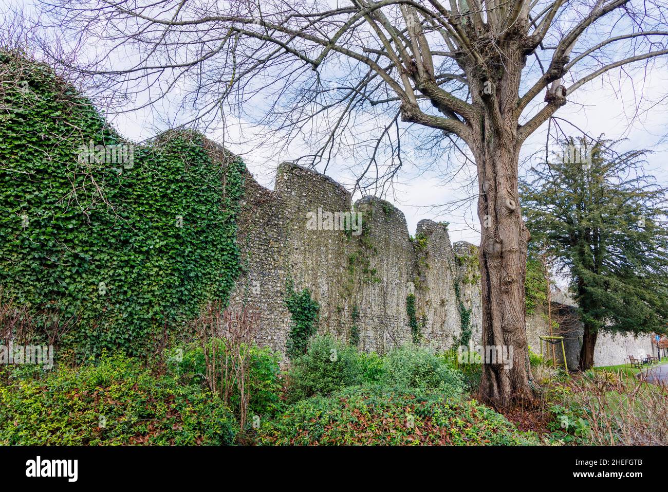 The remains and ruins of the medieval city wall and battlements by the ...