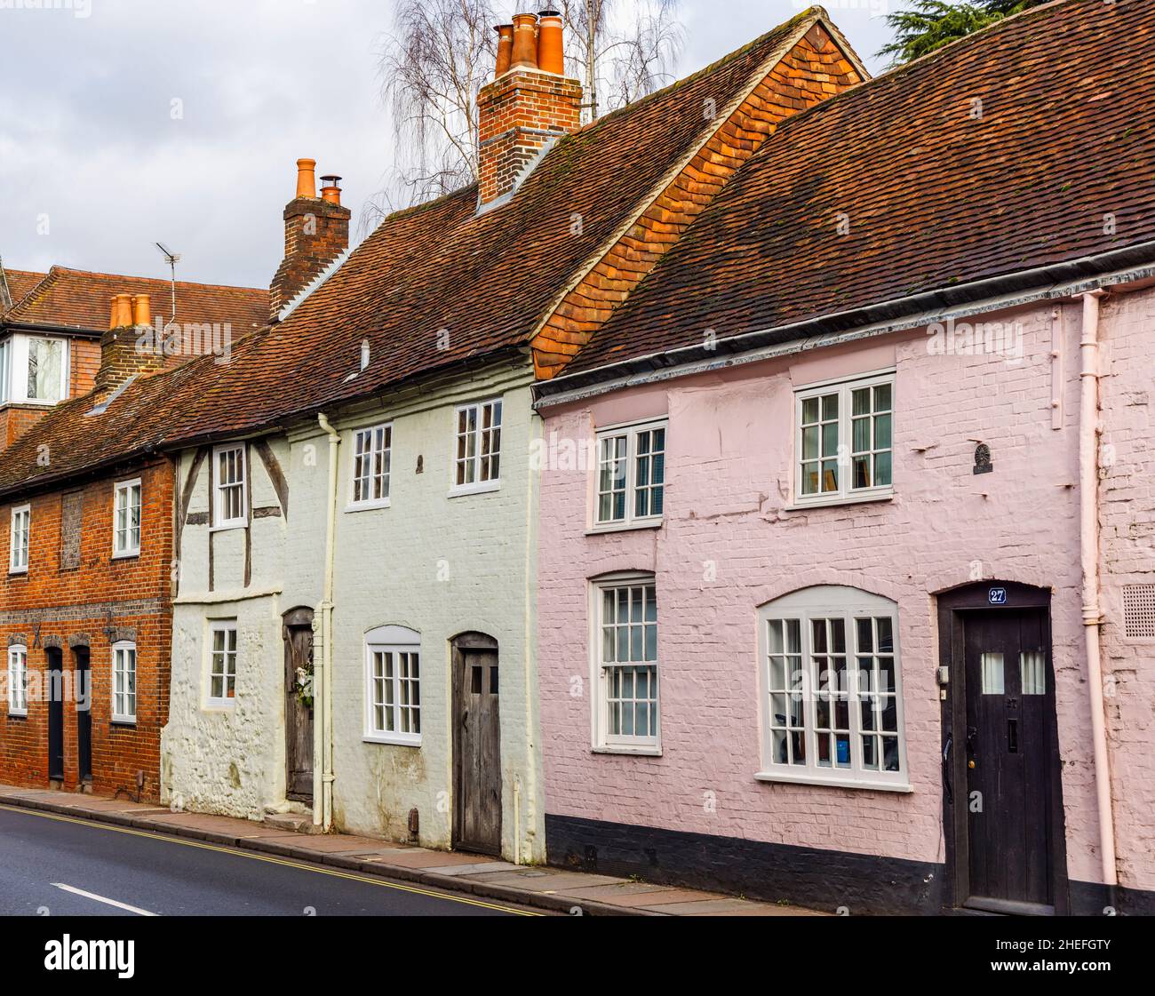 Quaint seventeenth century ancient cottages fronting Chesil Street in ...