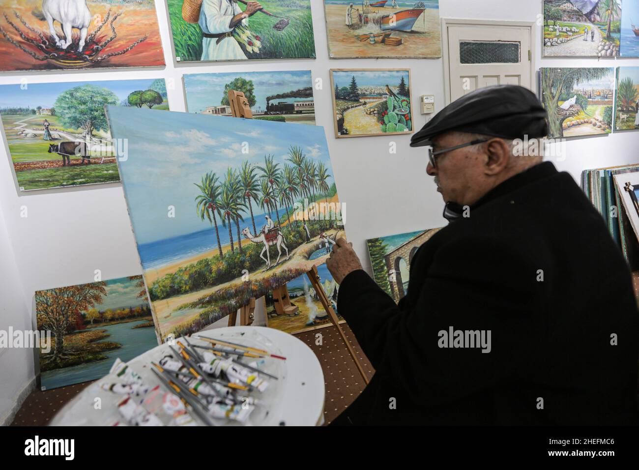 Palestinian painter Muhammad al-Astal, 84 years old, makes a painting ...
