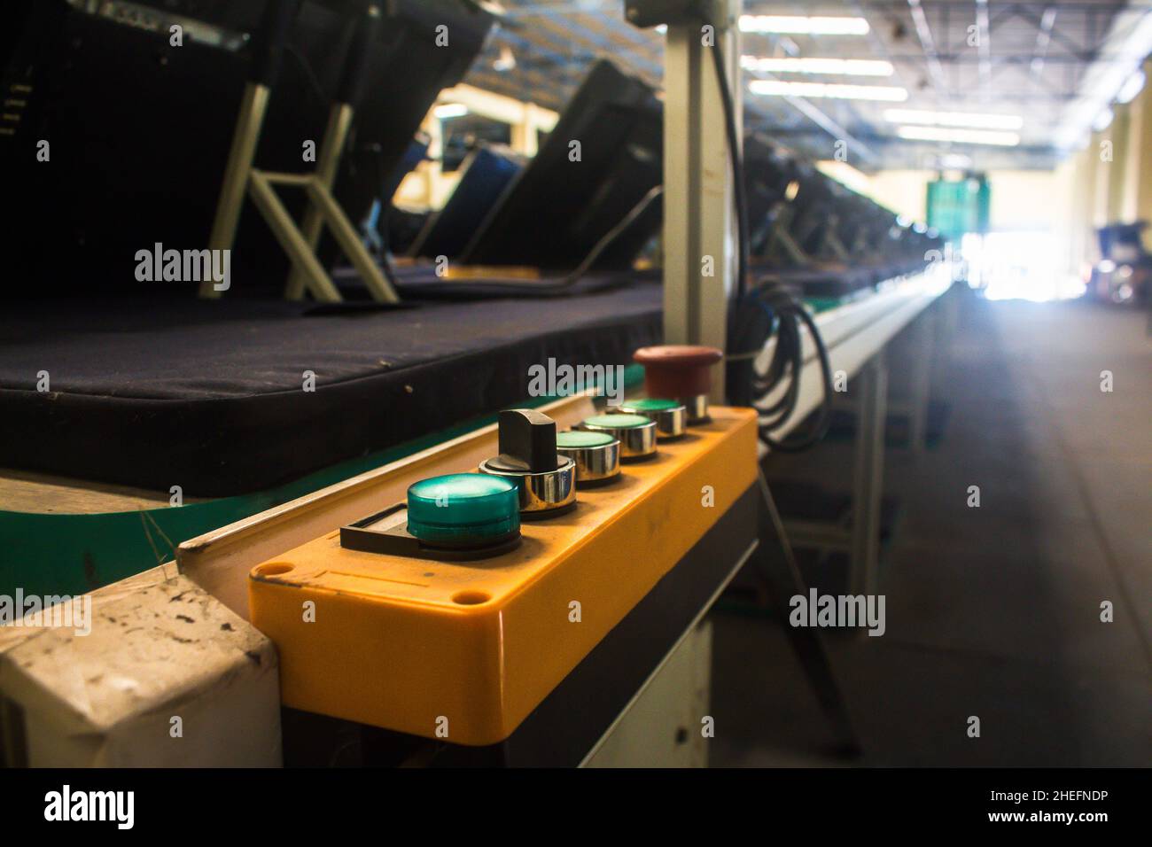 Control buttons installed at line conveyor for TV assembly line Stock ...
