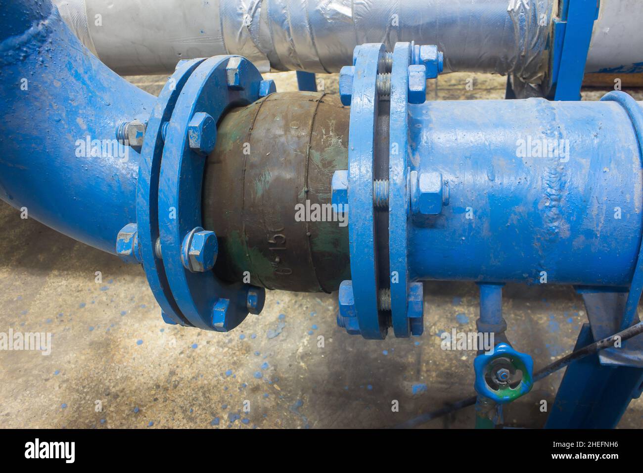 The Large pipe joints and water valve in pipe tap water of the ...