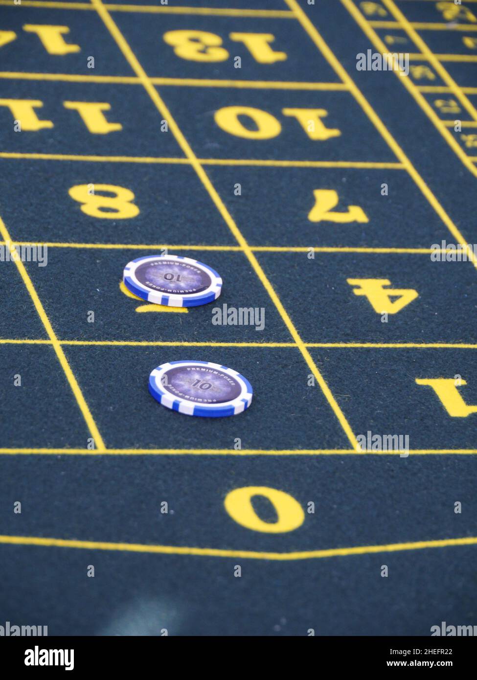 playing with chips at a roulette table Stock Photo - Alamy