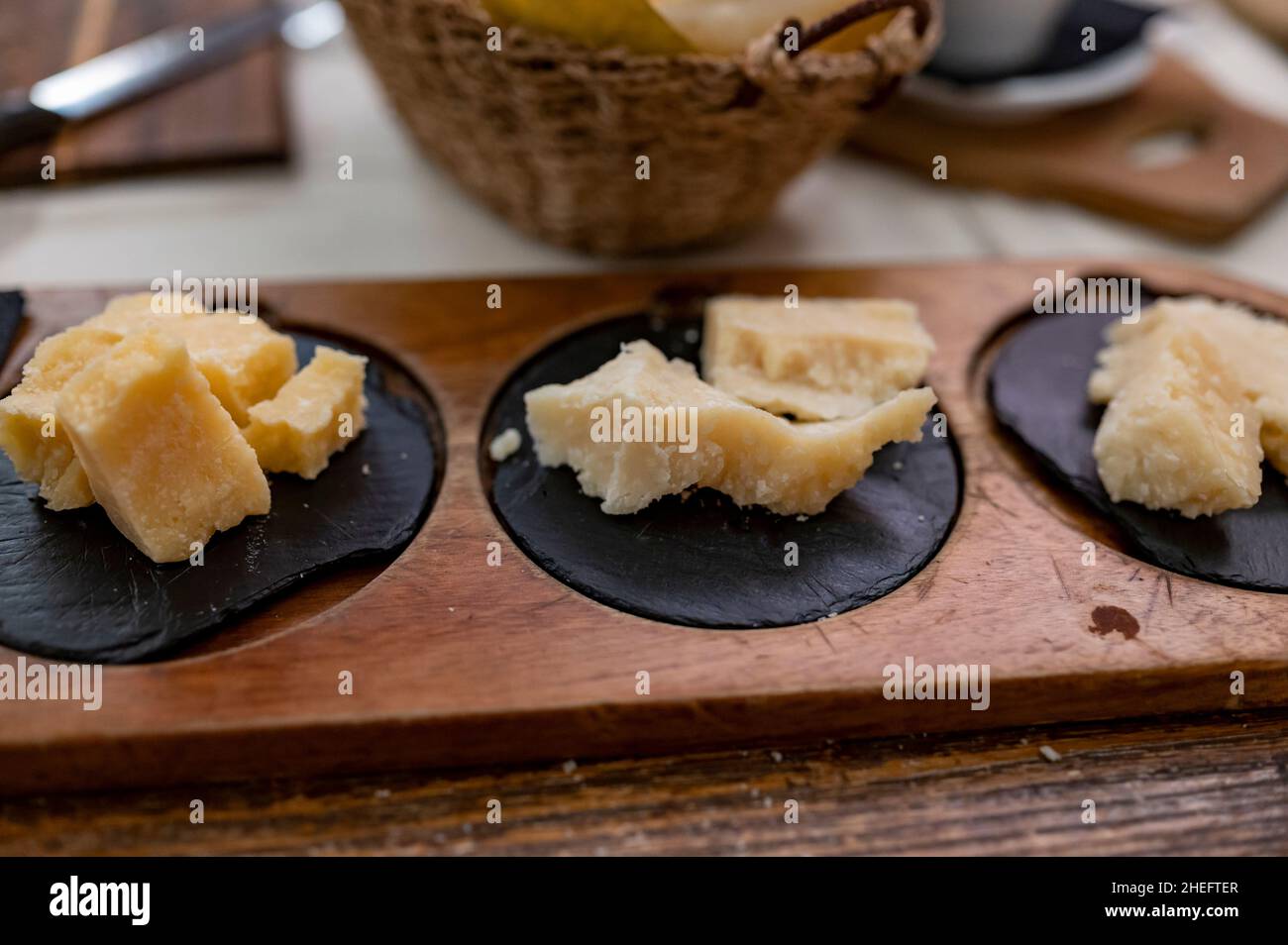 Tasting of different matured and very old parmesan Italian Parmigiano ...