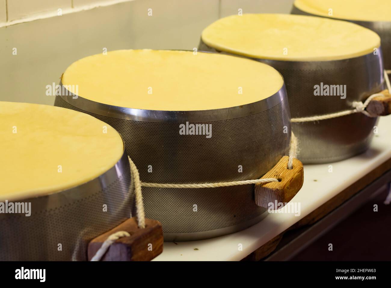 Process of making parmigiano-reggiano parmesan hard cheese on small ...