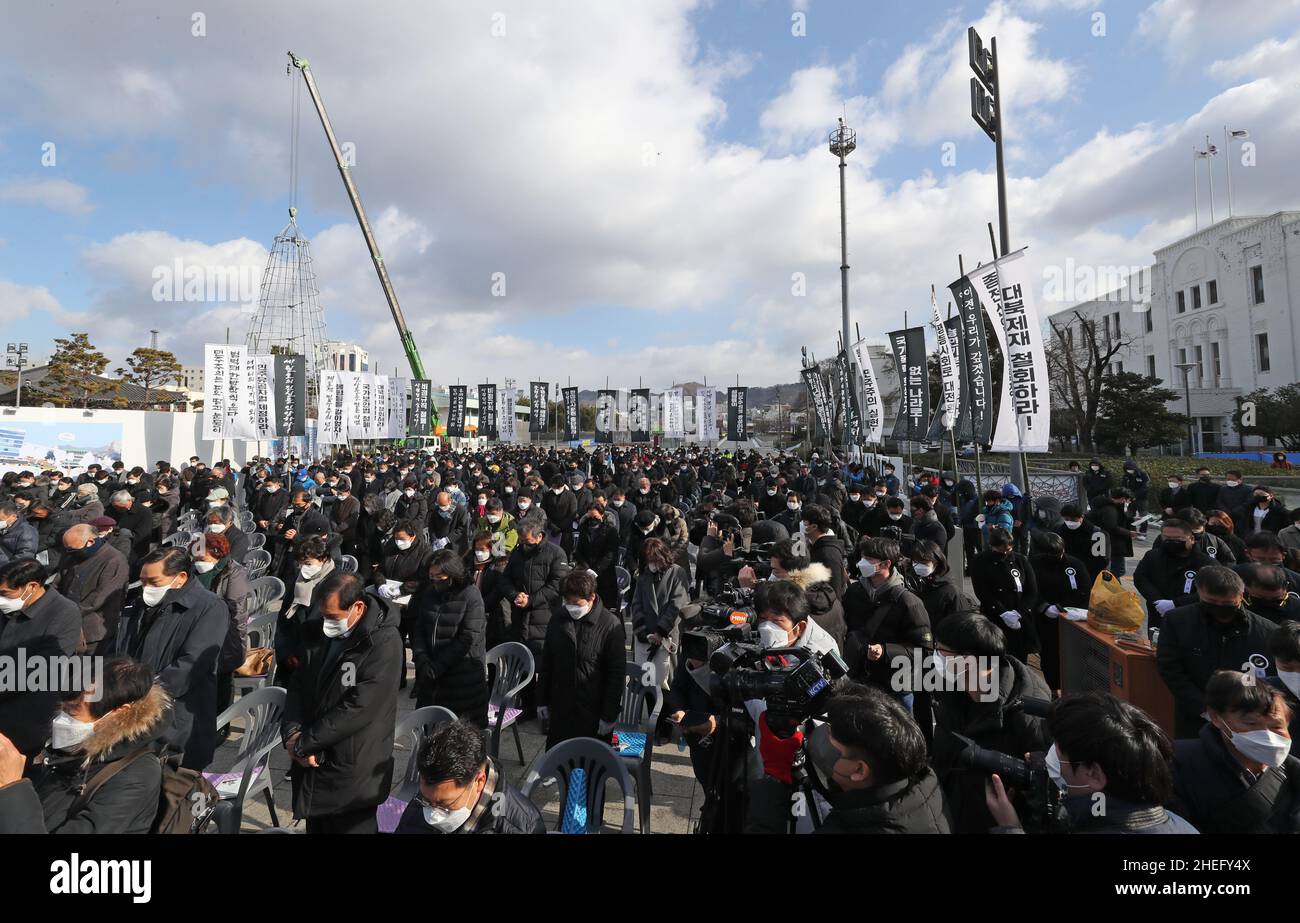 11th Jan, 2022. Funeral for late activist Mourners offer silent prayers ...